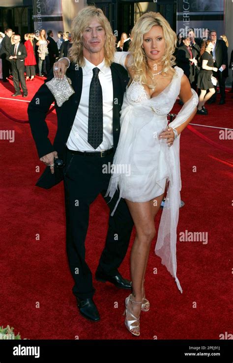 Duff Mckagan Of The Band Velvet Revolver And His Wife Susan Arrive