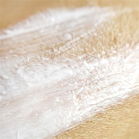 Premium Photo Body Skin Texture With Sunscreen On It