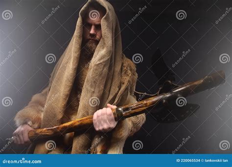 Copy Space Portrait Mysterious Man In Robes And Furs Stands And Holds