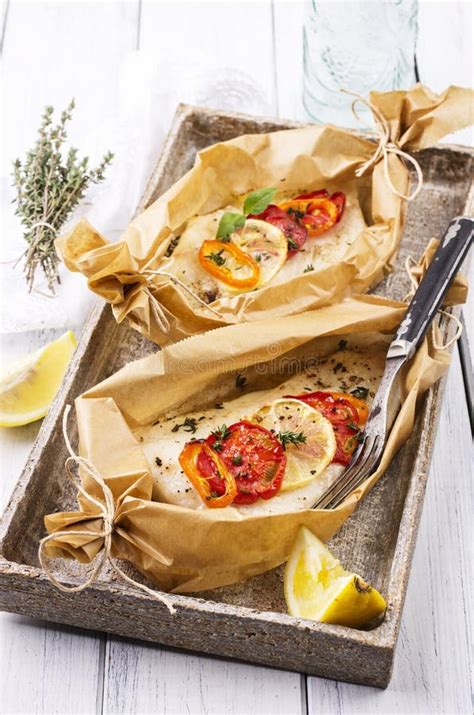 Traditional Baked Cod Fish Fillet With Vegetable And Herbs In Backing