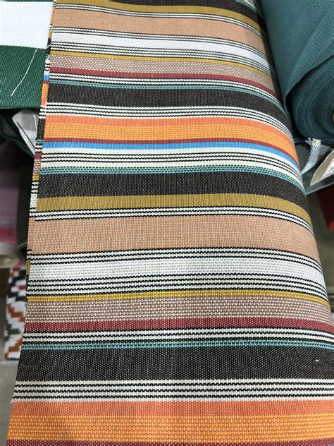 Multicolored Striped Cushion On Chair Tejido Tela