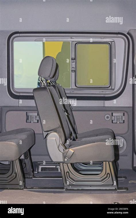Two By Two Seating In Mini Bus Passengers Transport Cabin Interior Side