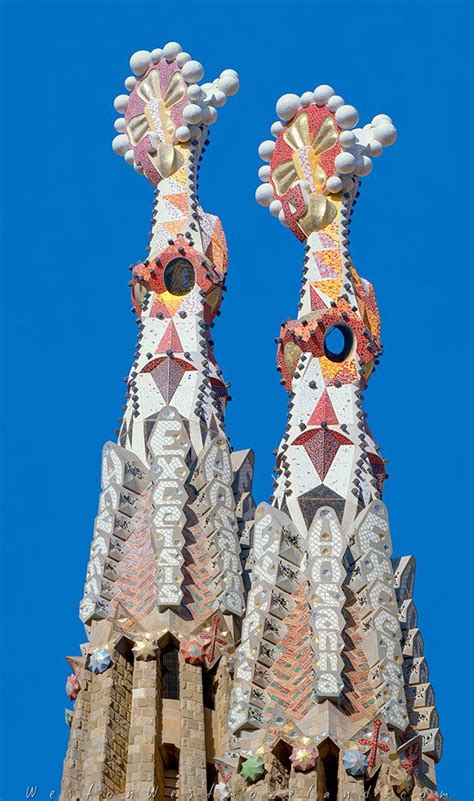 The Mosaic Pinacles Of Two Spires Of Gaudís Sagrada Familia Gaudí