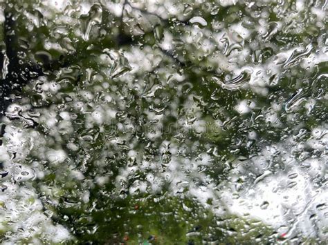 Glass Dripping With Rainwater Seen From The Inside Of The Glass Water