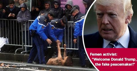 Topless Woman Caught Chasing Trumps Cortege During Heavy Rain In France