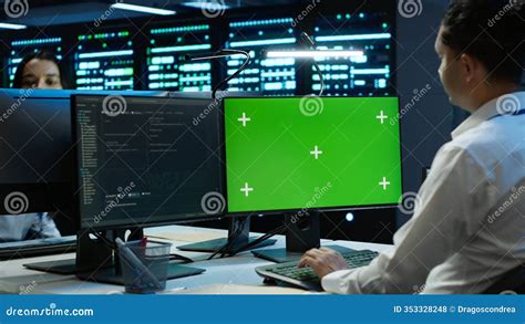 Engineer In Data Center Monitoring Security Threats Using Mockup