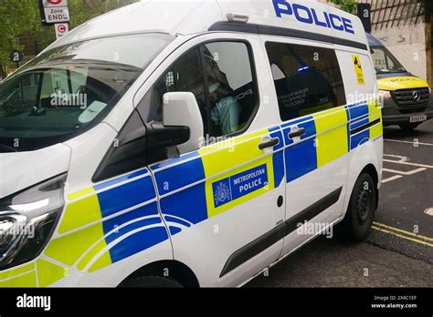 A Police Van Arrives At Westminster Magistrates Court London Where