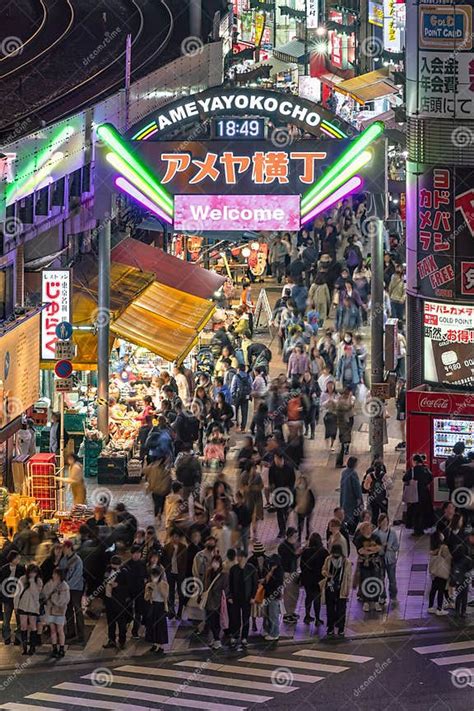 ameyoko shopping street arch welcoming tourists at night in english