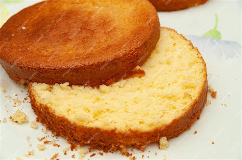 Premium Photo Making Sponge Cake Cut In Half Closeup Top View