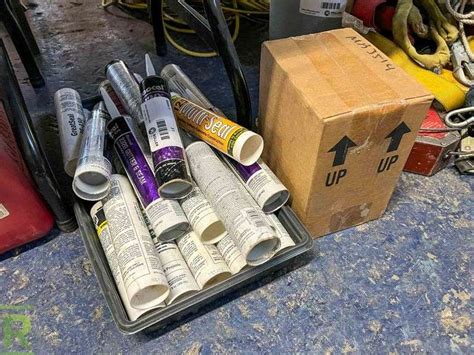 Tray Of Gutter Caulk Roller Auctions