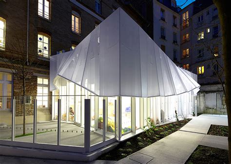 Nursery By H2o Architectes Enveloped By A Folded Fabric Sunshade