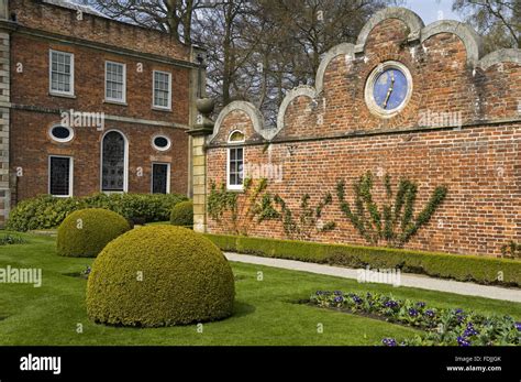 The Cusped Gable Wall With Clock Brought From Stansty Park And The