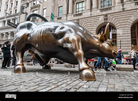 The Charging Bull Bronze Sculpture Also Known As Wall Street Bull Or