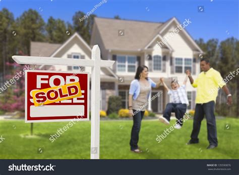 People In Front Of House With A Sold Sign Over 475 Royalty Free