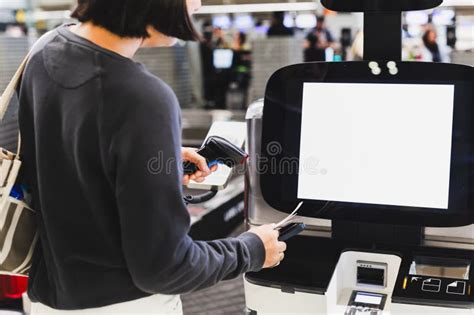 Woman Passenger Self Check In Scanning Qr Code Boarding Pass At Airport