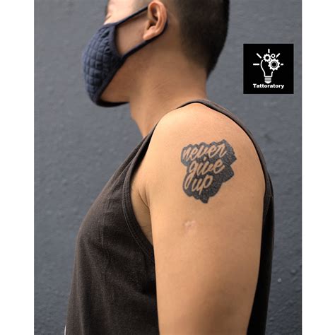 Never Give Up Symbol Tattoo