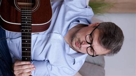 Vertical Guitar Hobby Man Playing Melody Home Stock Footage Video Of Casual Smart 317234434
