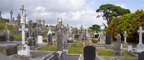 An Christian Cemetery In Ireland Stone Tombstones Celtic Cross