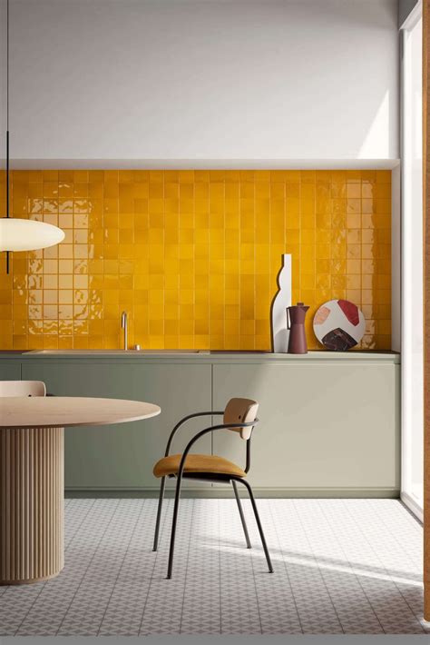 Yellow Vitra Tiles Line The Wall Of This Colourful Kitchen Kitchen