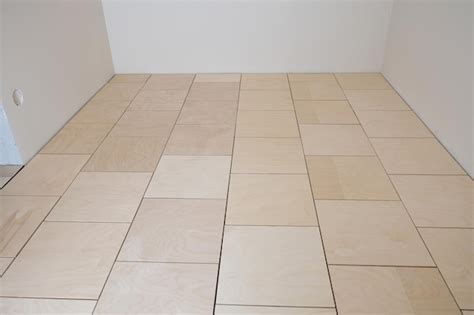 Premium Photo Laying Of The Rough Floor Substrate Of Thick Plywood In