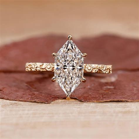 Art Deco Engagement Ring Features A Dutch Marquise Diamond In A Strong