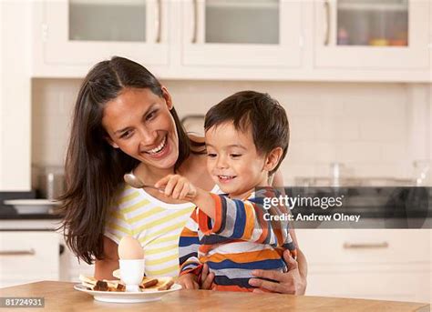 Boy Eating Egg Photos And Premium High Res Pictures Getty Images