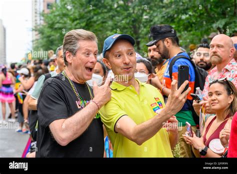 Mayor John Tory Poses For A Selfie With A Member Of The General Public