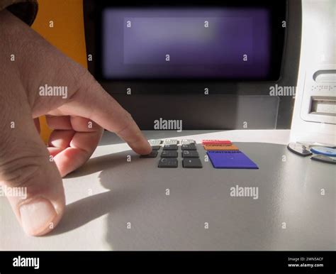 Mature Man Finger Pressing Password Number On Atm Machine Accesible Mature Man Finger Pressing Password Number On Atm Machine Accesible