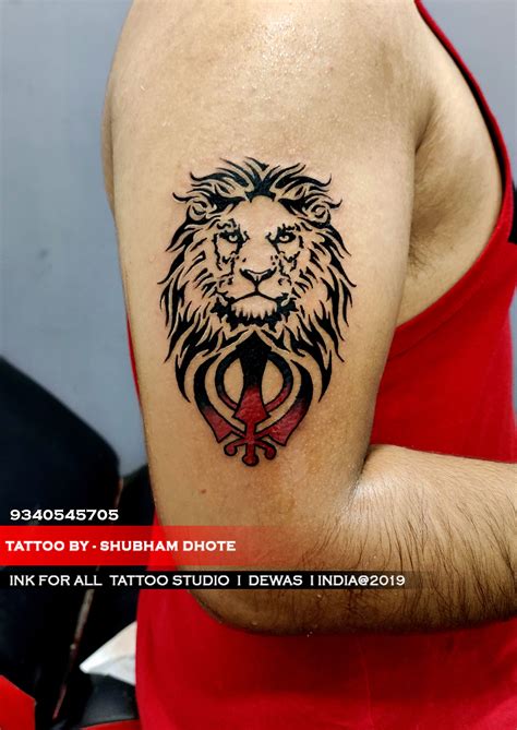 Khanda With Lion Tattoo Designs