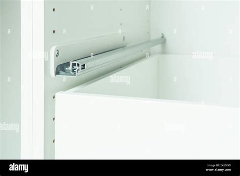 Drawer Rail Inserted Into Cabinet Fixed With Self Tapping Screws Assembling White Dresser Or