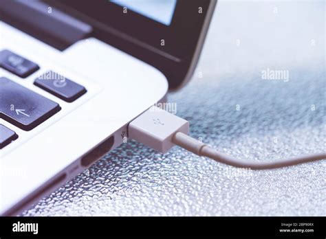 Usb Cable Into Laptop Close Up Photo Stock Photo Alamy