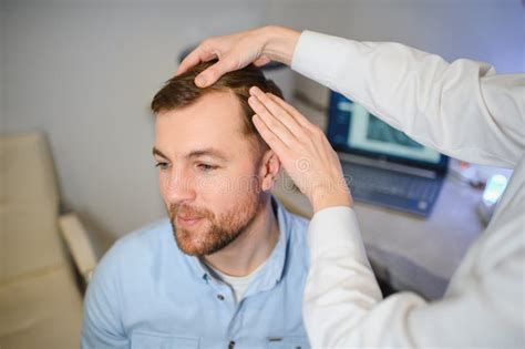 Trichoscope Examination Of Hair Scalp And Hair Follicles Of A Young Man Copy Space Banner