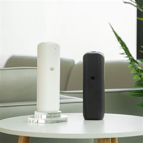 Sleek Cylindrical Aroma Diffuser Bluetooth Controlled Silent