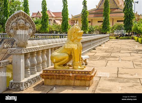 Cambodian Five Headed Naga And A Lion Depicted As Guardian Statues At