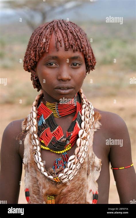 Portrait Of A Young Woman Of The Hamer Tribe The Hair Is Coated With