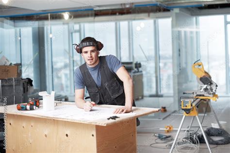 Portrait Man Or Builder Drawing Floor Plan For Drafting Industrial Architecture Project At