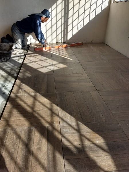 Foto Colocación De Loseta Cerámica De Hgarquitecto 322879 Habitissimo
