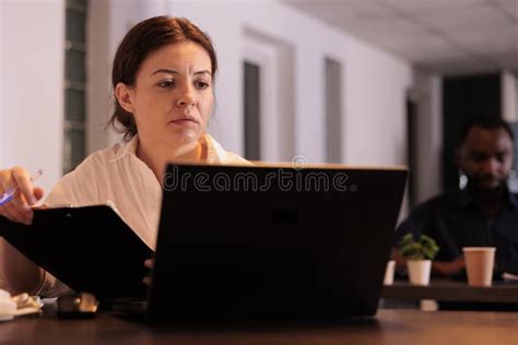 Office Manager Checking Company Report Comparing Data On Computer Stock Image Image Of Late