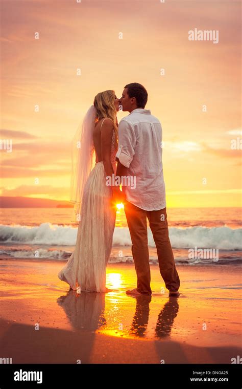 Wedding On Beach At Sunset