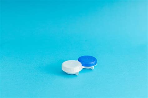 Premium Photo Eye Lens Case On Blue Background