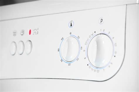 Premium Photo Temperature And Washing Programs Switch Knobs On A