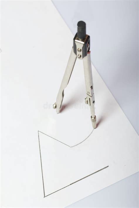 A Figure Drawn By A Compass On White Paper Triangle Circle And