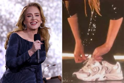 Adele Wears Sneakers Amid Rainstorm At Munich Show Exclusive Photos