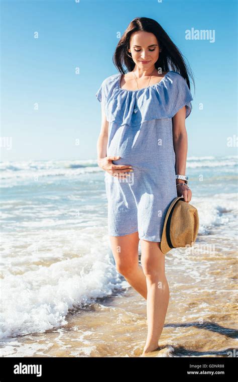 Expectant Mother Have Fun In The Sea Stock Photo Alamy