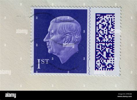Purple 1st Class Stamp First Class Stamp With King Charles Iii Head Stuck On Envelope Stamp