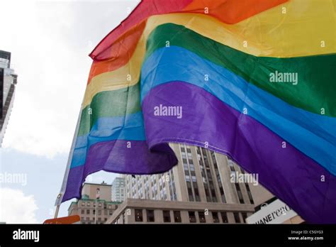 The Gay Pride Rainbow Flag Flies Under The Empire State Building During