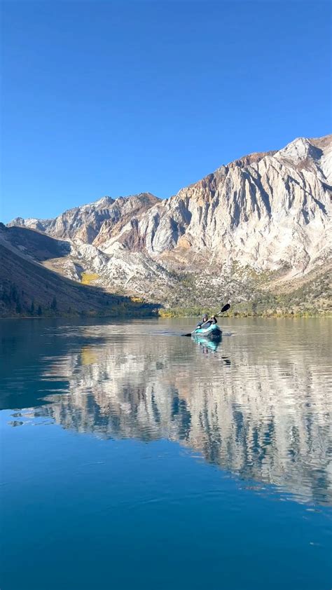 Imagine Paddling Through Golden Aspens With Rugged Sierra Peaks Rising