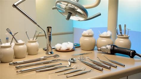 Dental Assisting Tools And Lamp On The Table Premium Ai Generated Image
