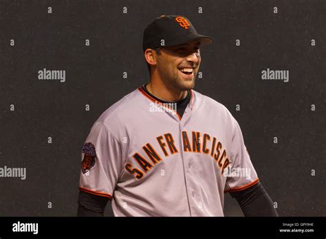 May 14, 2011; Chicago, IL, USA; San Francisco Giants left fielder Mark DeRosa (7) laughs while ...
