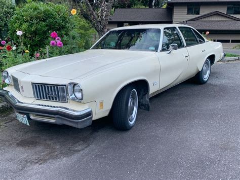 Yellow 1975 Oldsmobile Cutlass 4 Dr V8 260 For Sale